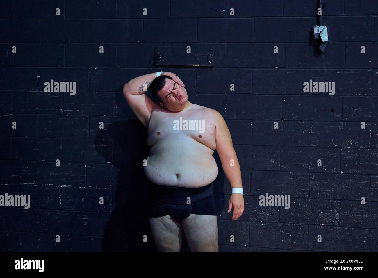 Sumo wrestler Jose Galindo warms up during the World Championship Sumo ...