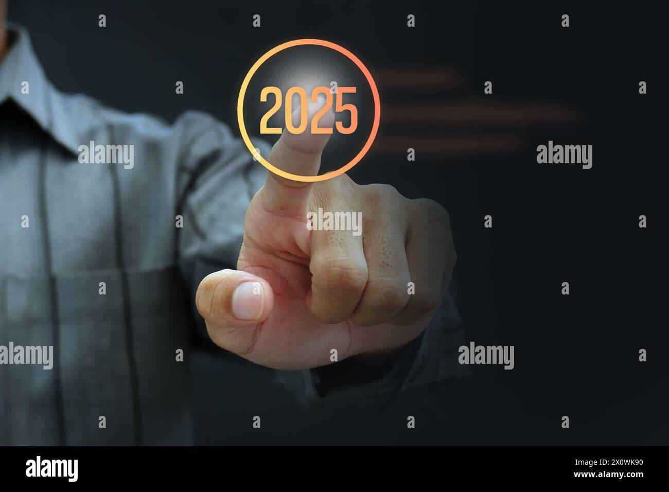 businessman pushing a 2025 button on a screen. New year 2025 Stock ...