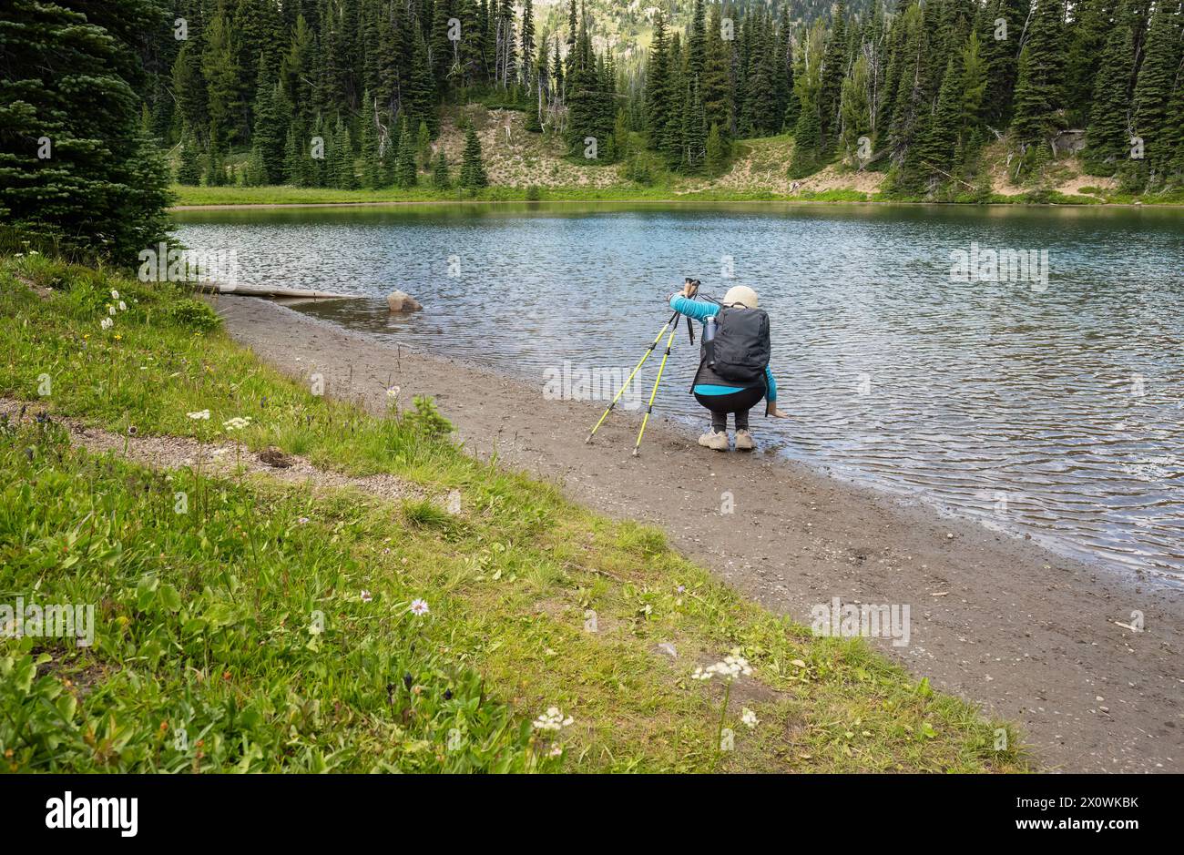 Woman checking water shadow hi-res stock photography and images - Alamy