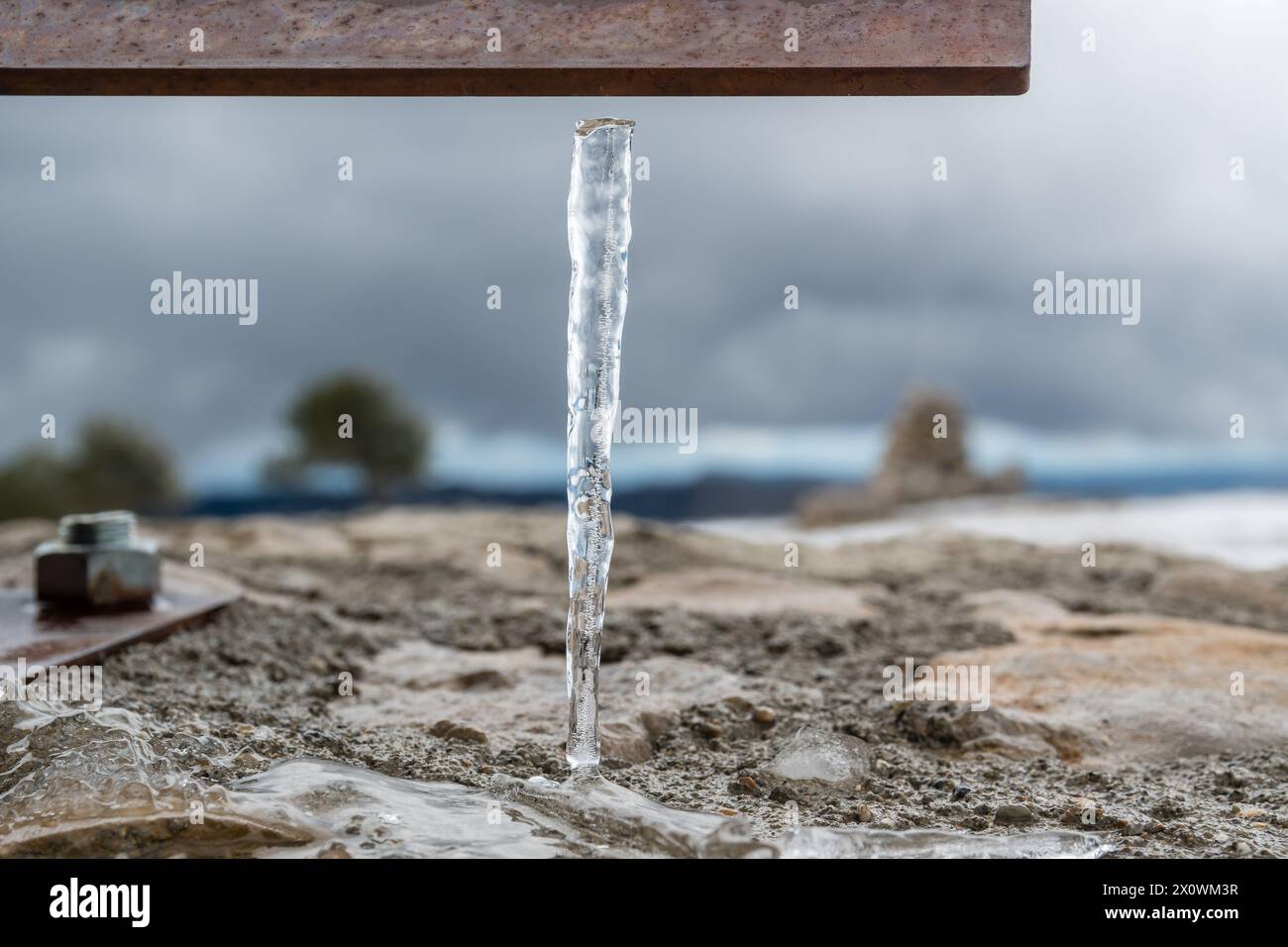 ice column standing on a sign in a mountain summit, Cap de Boumort ...