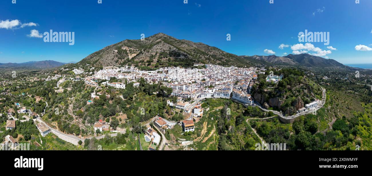 aerial view of the beautiful Mediterranean village of Mijas on the ...