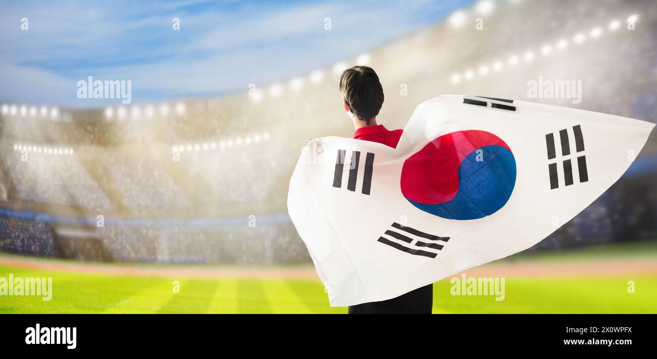 South Korea football supporter on stadium. Korean fans on soccer pitch ...