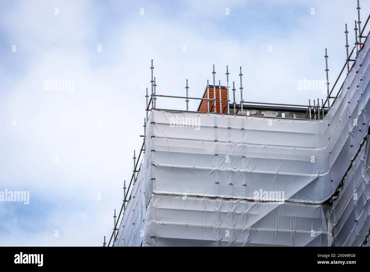 Flame retardant scaffold sheeting wrapped apartments building during ...