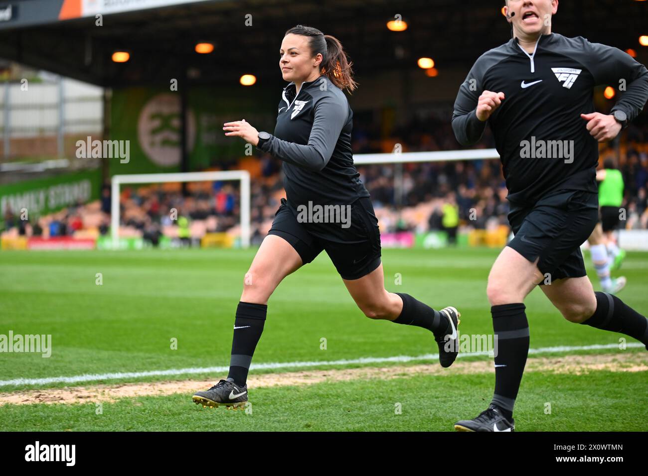 Burslem, UK, 13th April 2024. Match official Lisa Rachid warming up ...