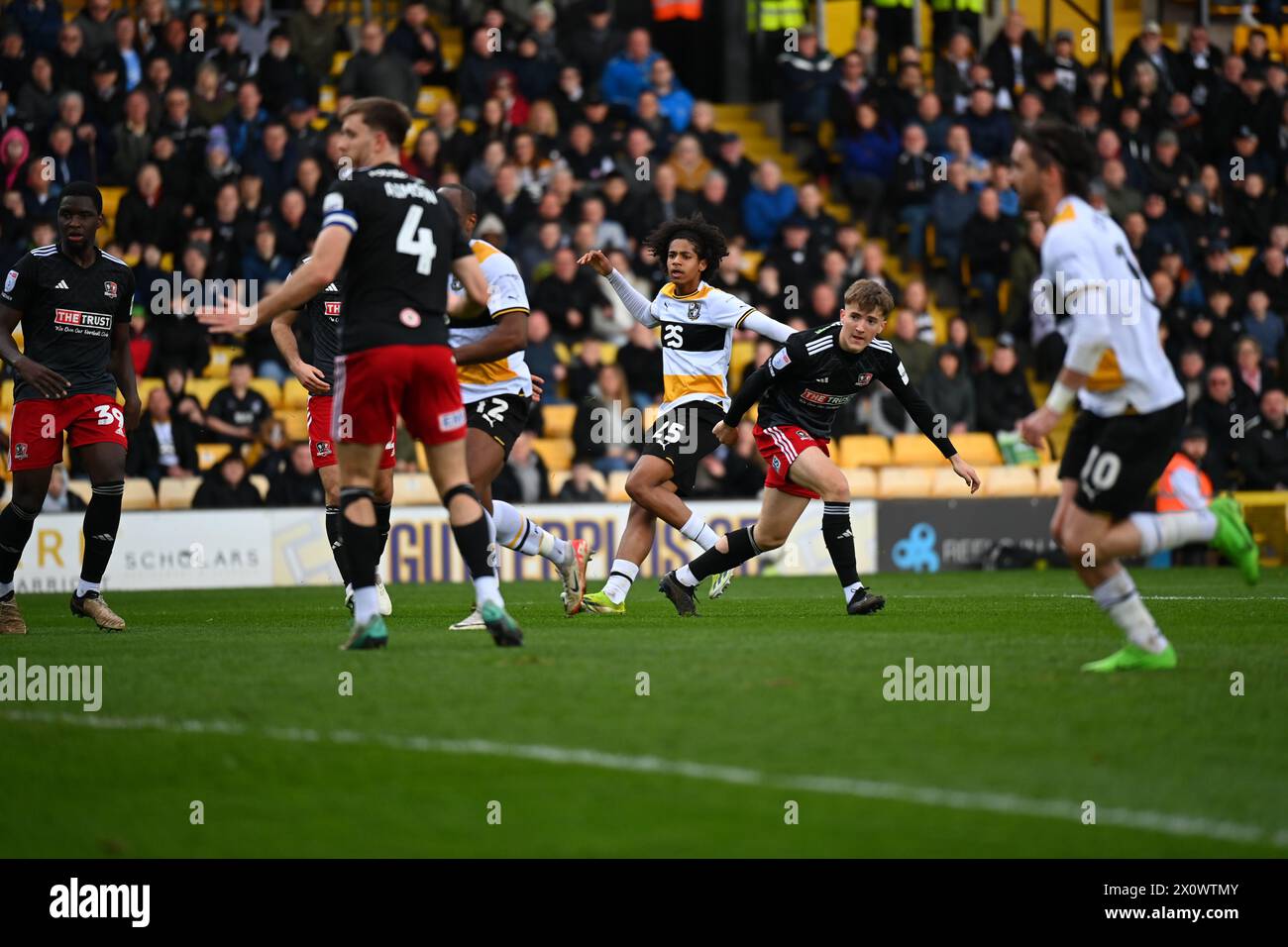 Burslem, UK, 13th April 2024. Port Vale number 25 Baylee Dipepa watches ...