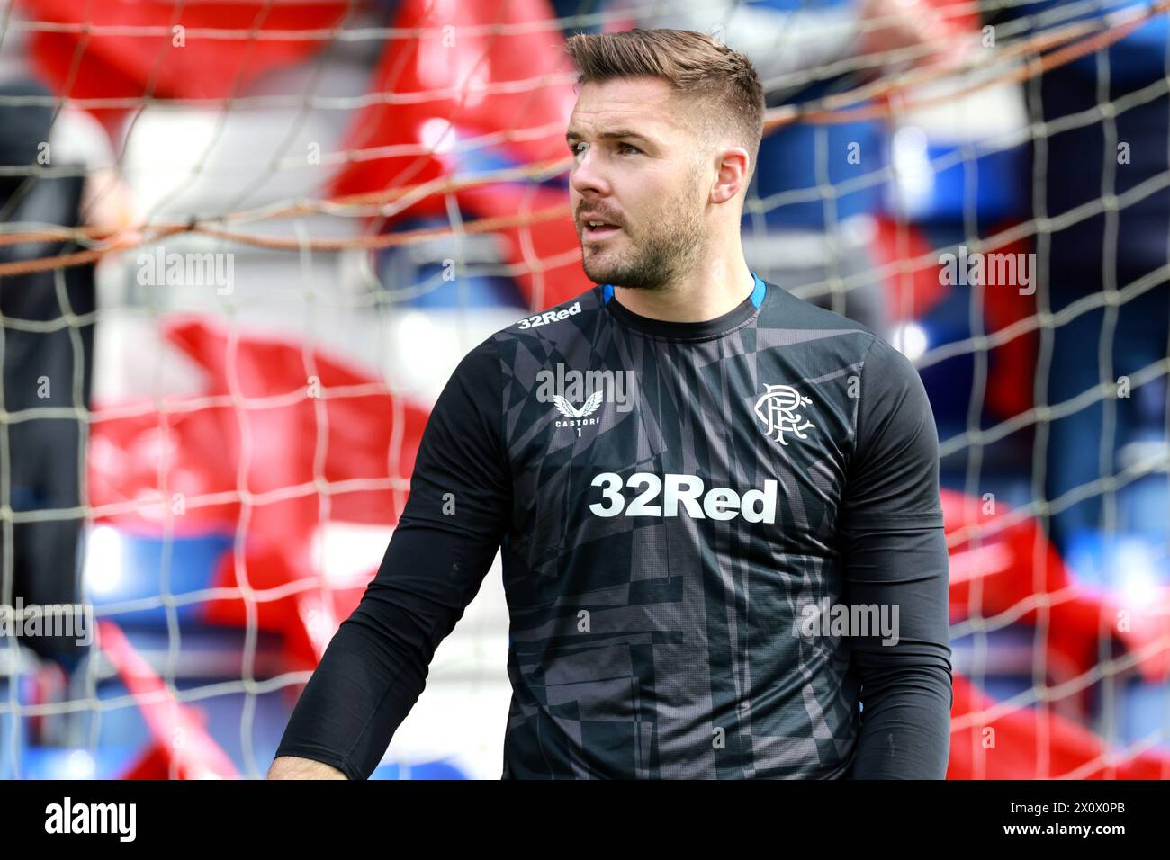 Rangers goalkeeper Jack Butland warming up prior to kick-off before the ...