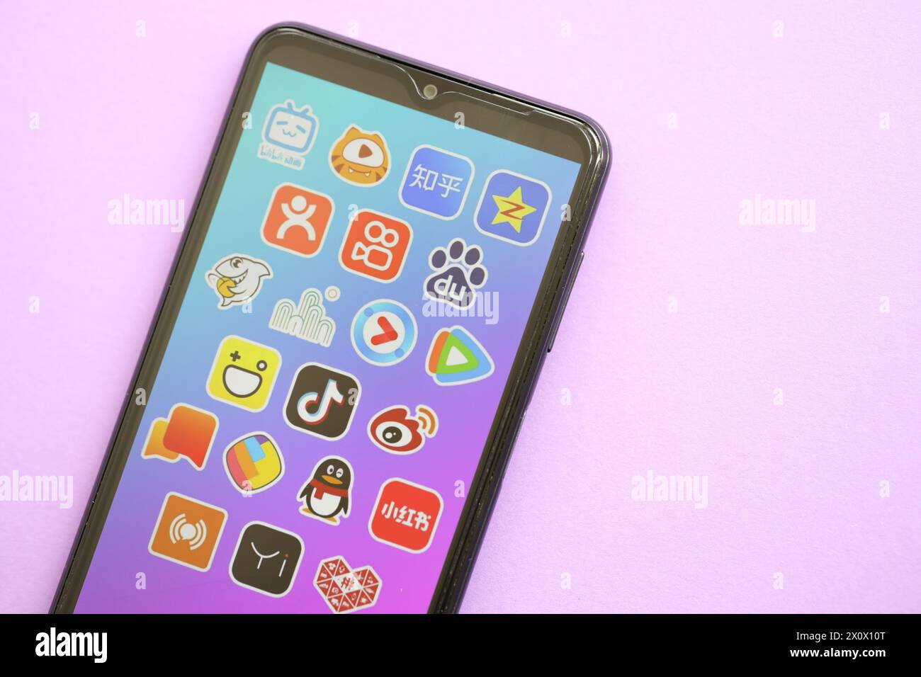 KYIV, UKRAINE - APRIL 1, 2024 Asian apps icon on smartphone screen on ...