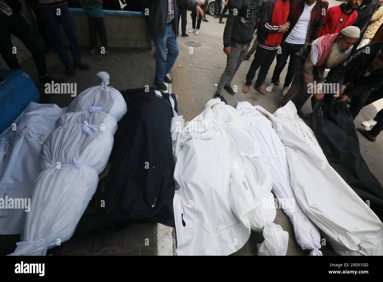 Relatives of the Palestinians died in Israeli attacks, mourn as they ...