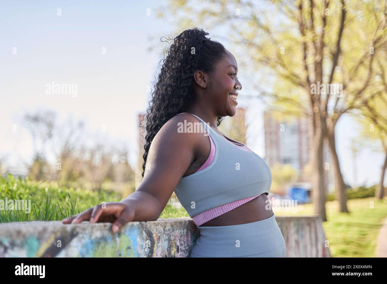 relaxed curvy athletic african american woman with curves Stock Photo ...