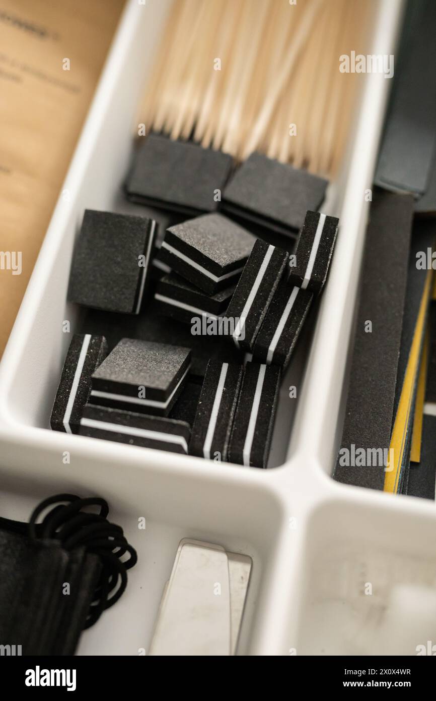 Manicure and pedicure tools. Nail file and cuticle pusher orange wood ...