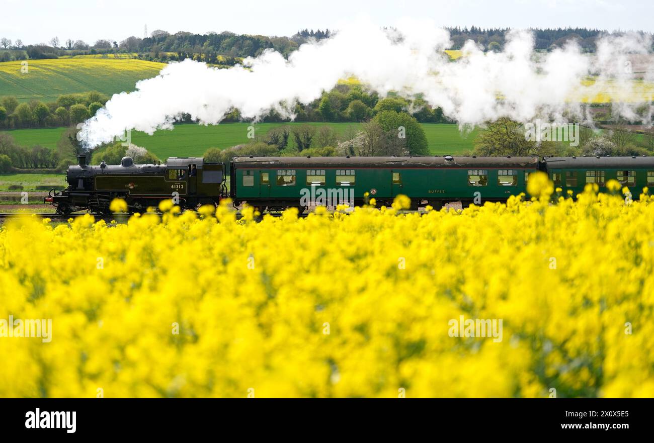 British Railways Ivatt Class 2MT Tank Engine number 41312 travels along ...