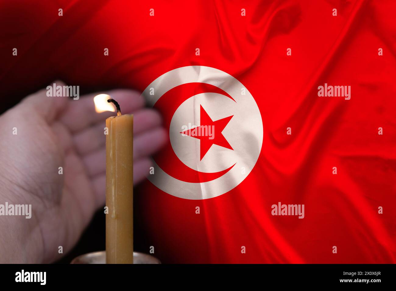 mourning candle burning front of flag , memory of heroes served country ...