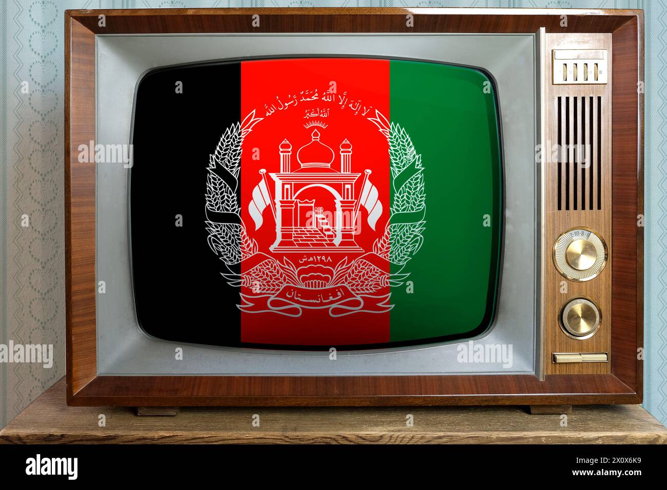 national flag Afghanistan on screen, stylish interior technology 60s, concept eternal values on ...