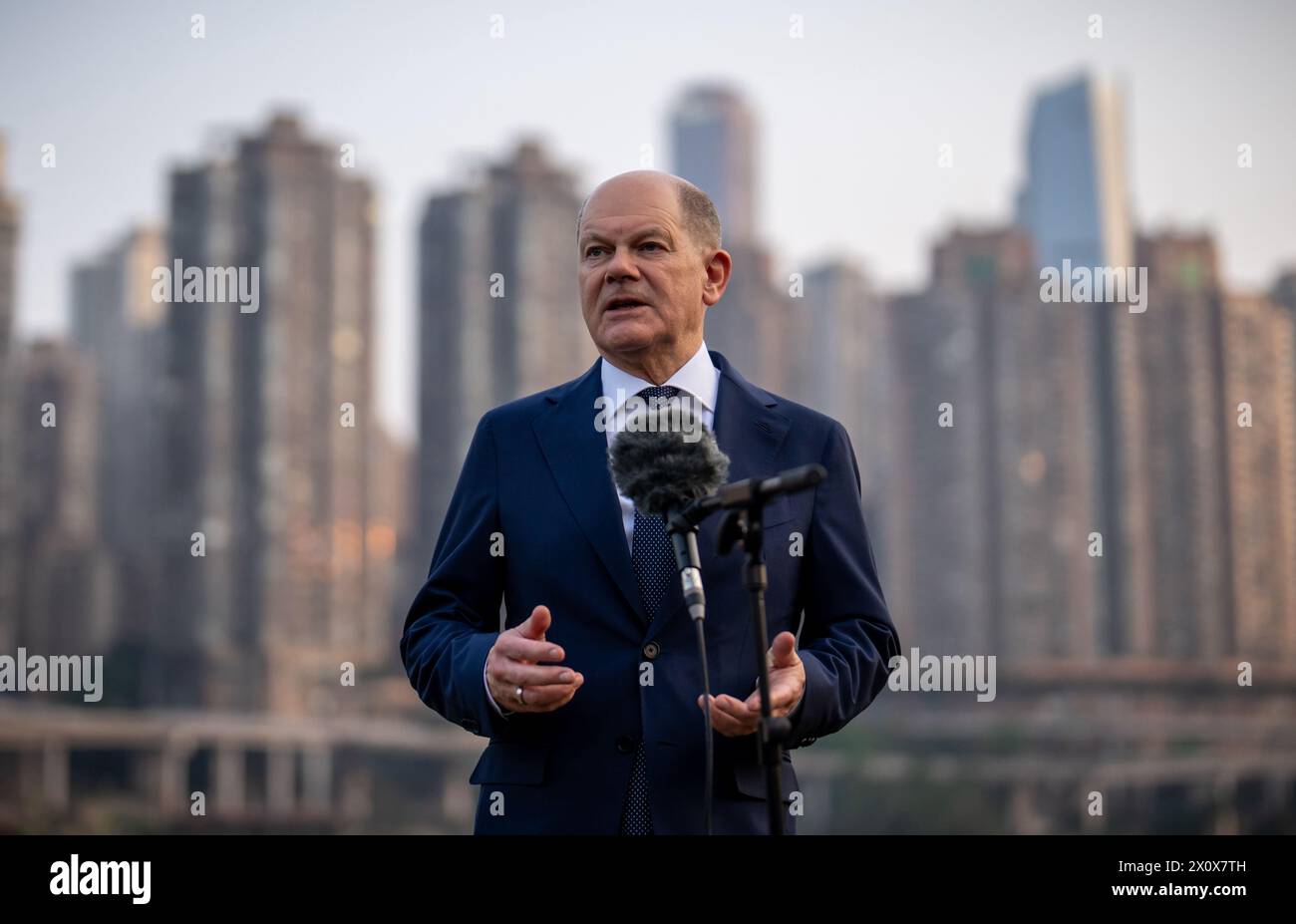 14 April 2024, China, Chongqing: Chancellor Olaf Scholz (SPD) makes a ...