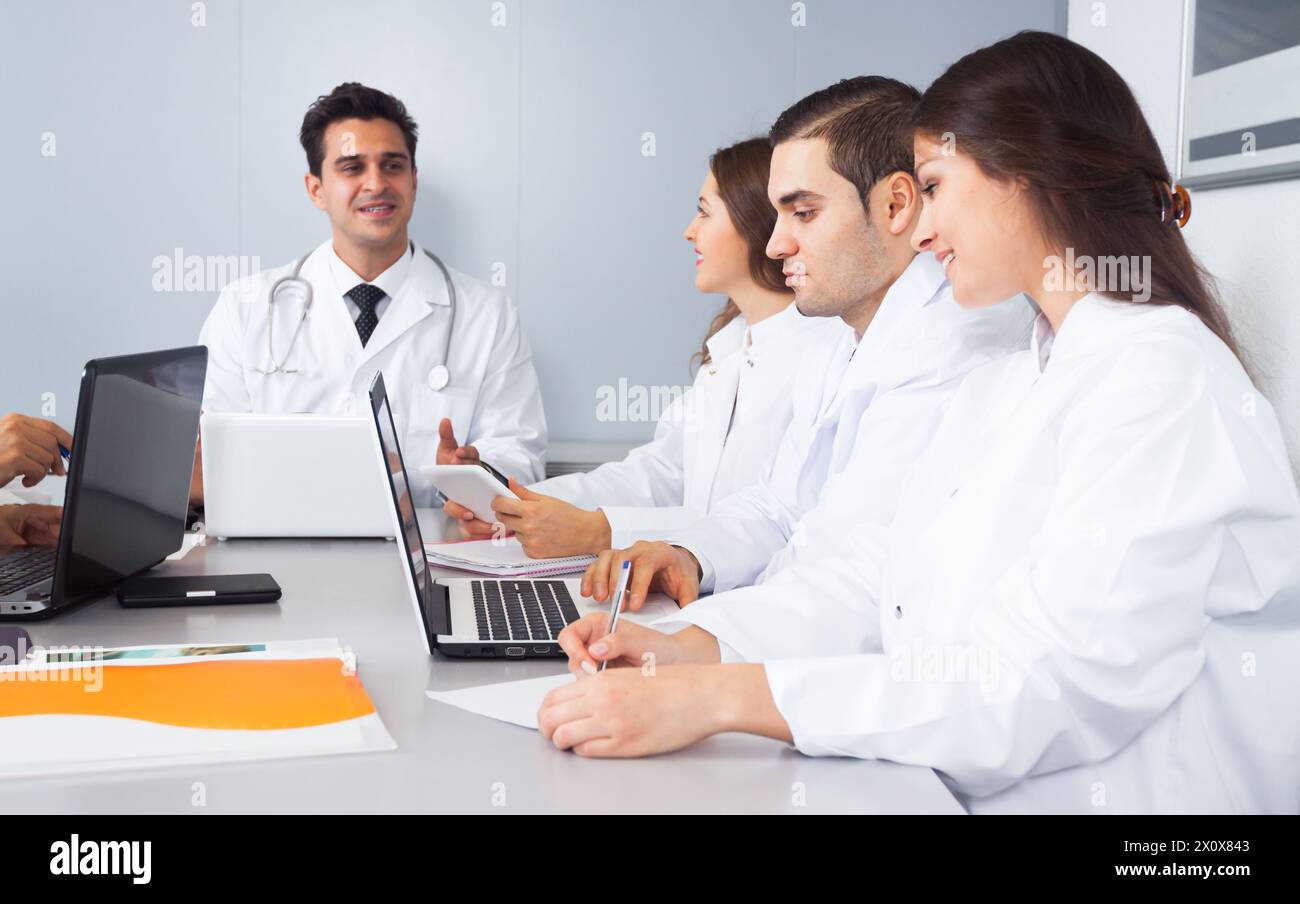 Meeting of clerks in conference room Stock Photo - Alamy