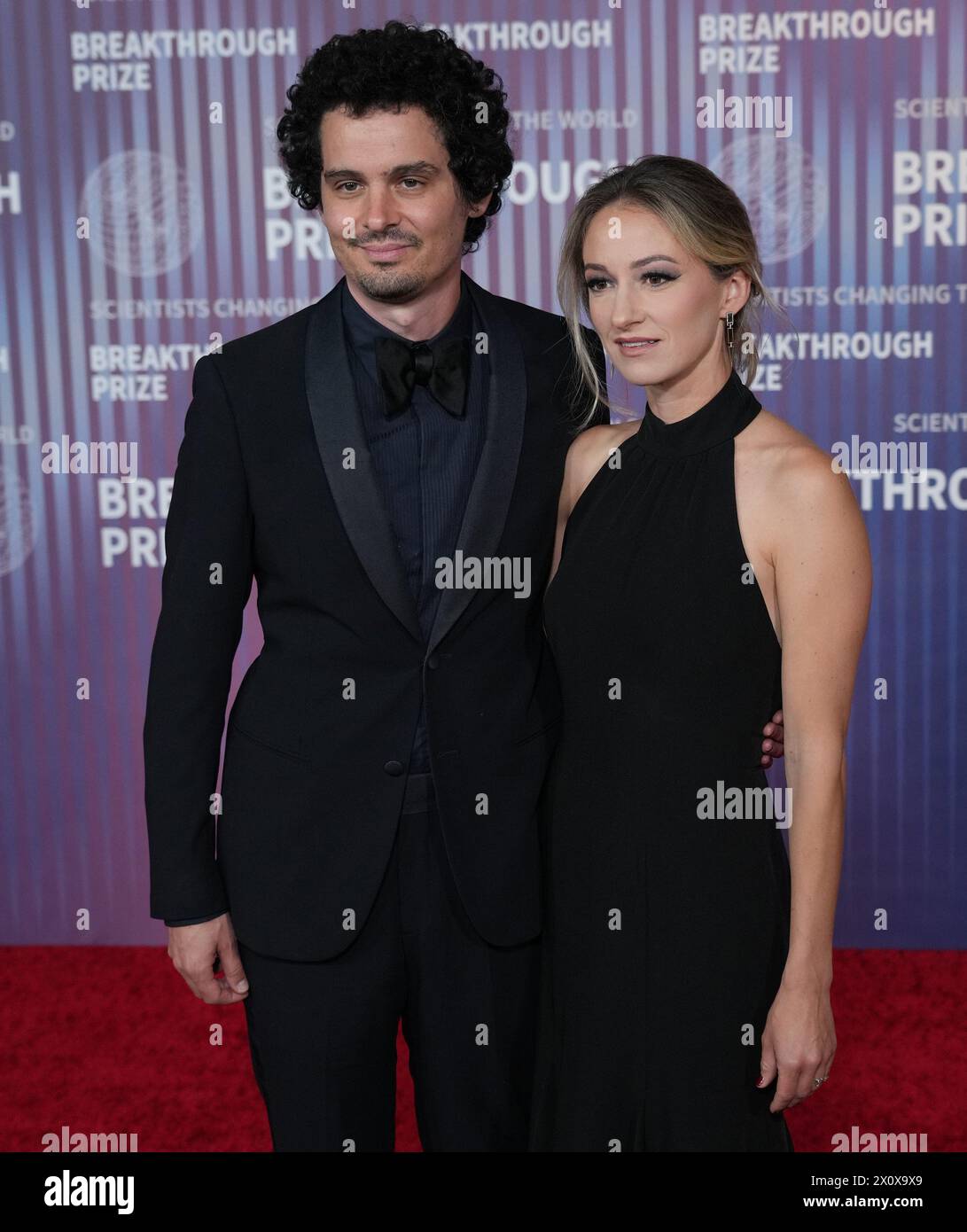 (L-R) Damien Chazelle and Olivia Hamilton arrives at the 10th Annual ...