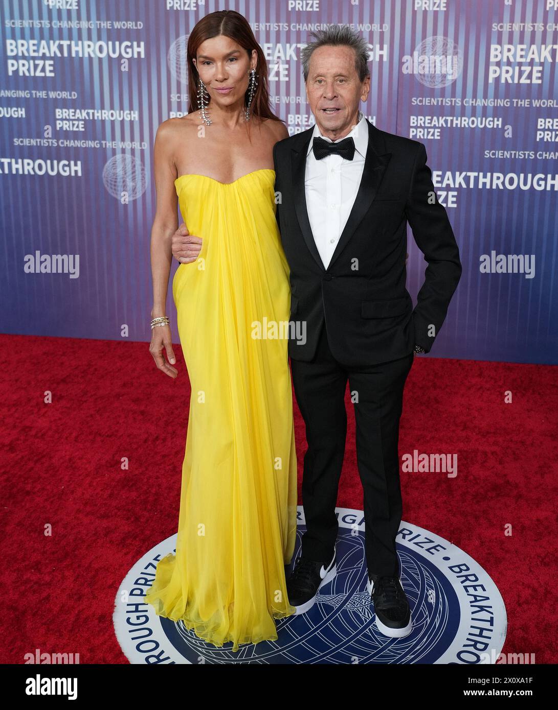 (L-R) Veronica Smiley and Brian Grazer arrives at the 10th Annual ...