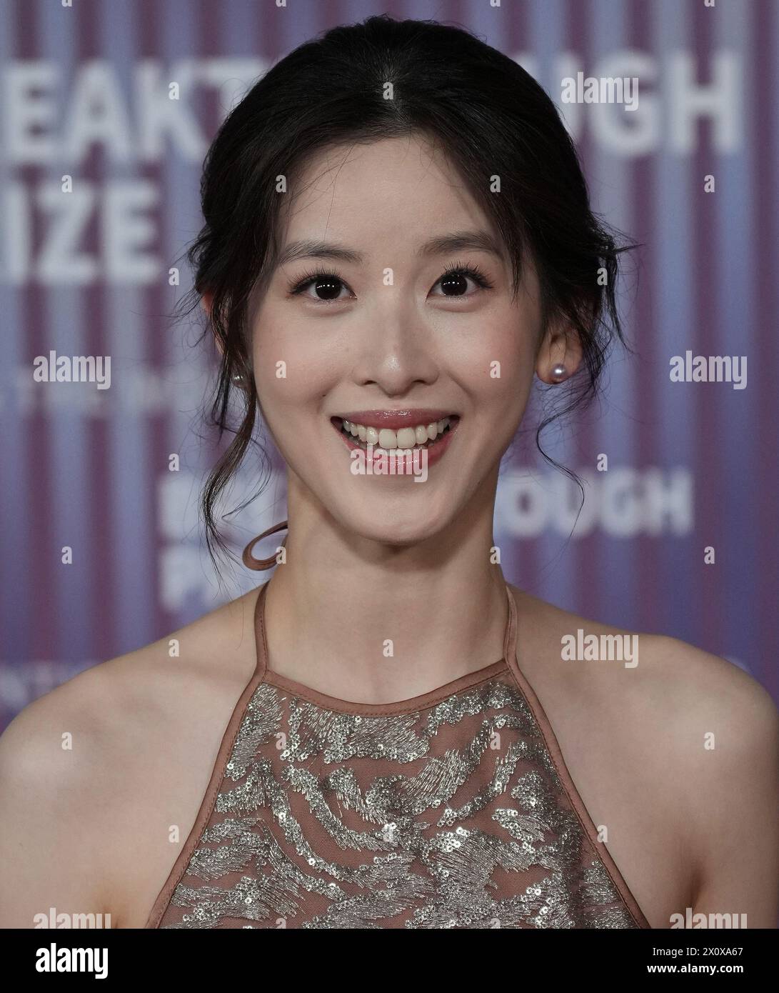 Nancy Zhang arrives at the 10th Annual Breakthrough Prize Ceremony held at the Academy Museum of ...