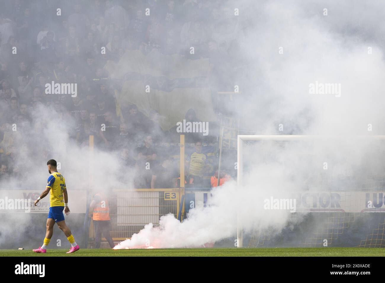 Fireworks and smoke bombs on the field during a soccer match between SK ...