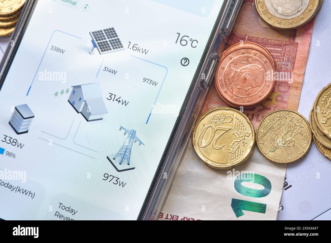 Solar panel app on a smart phone monitoring electricity generated from ...