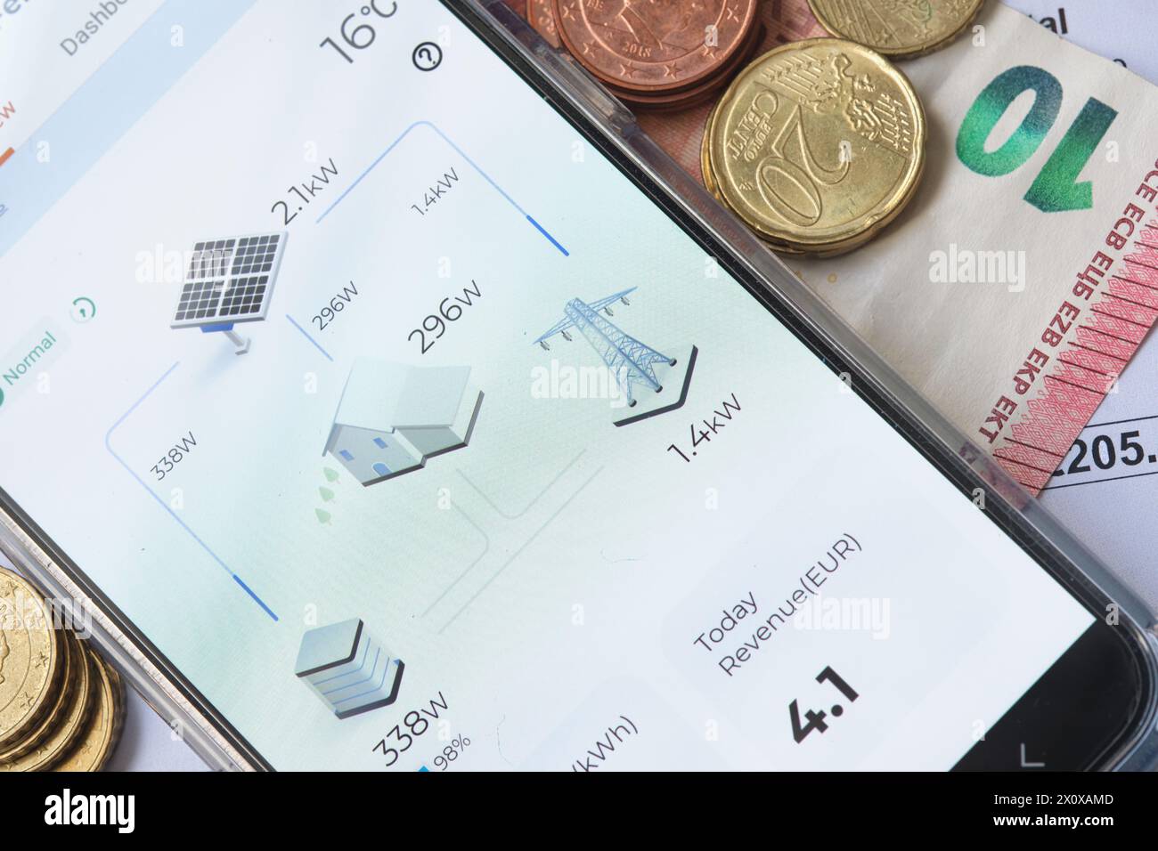 Solar panel app on a smart phone monitoring electricity generated from ...