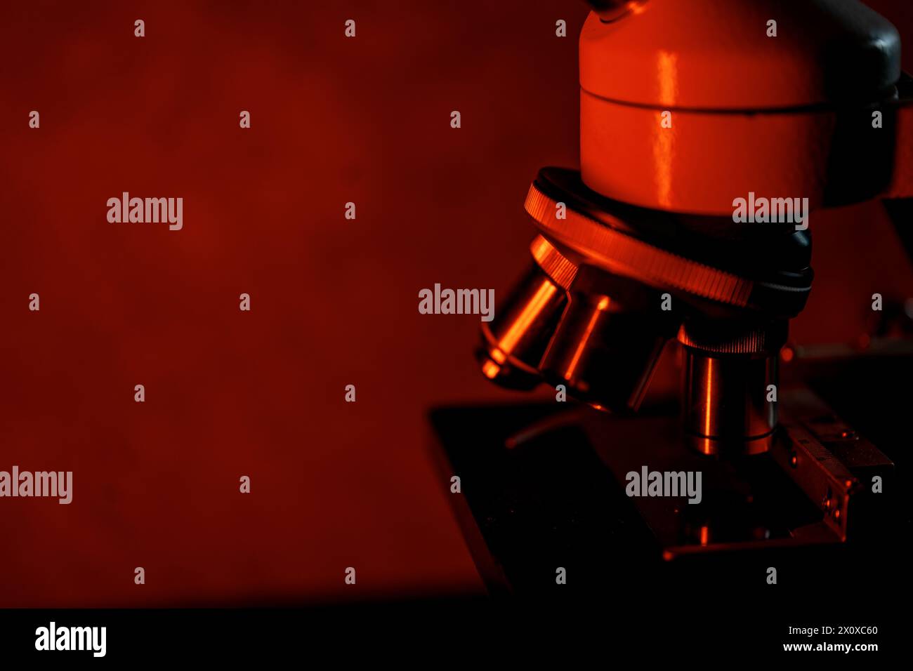 Medical microscope lenses close up, In warm red lighting Stock Photo ...