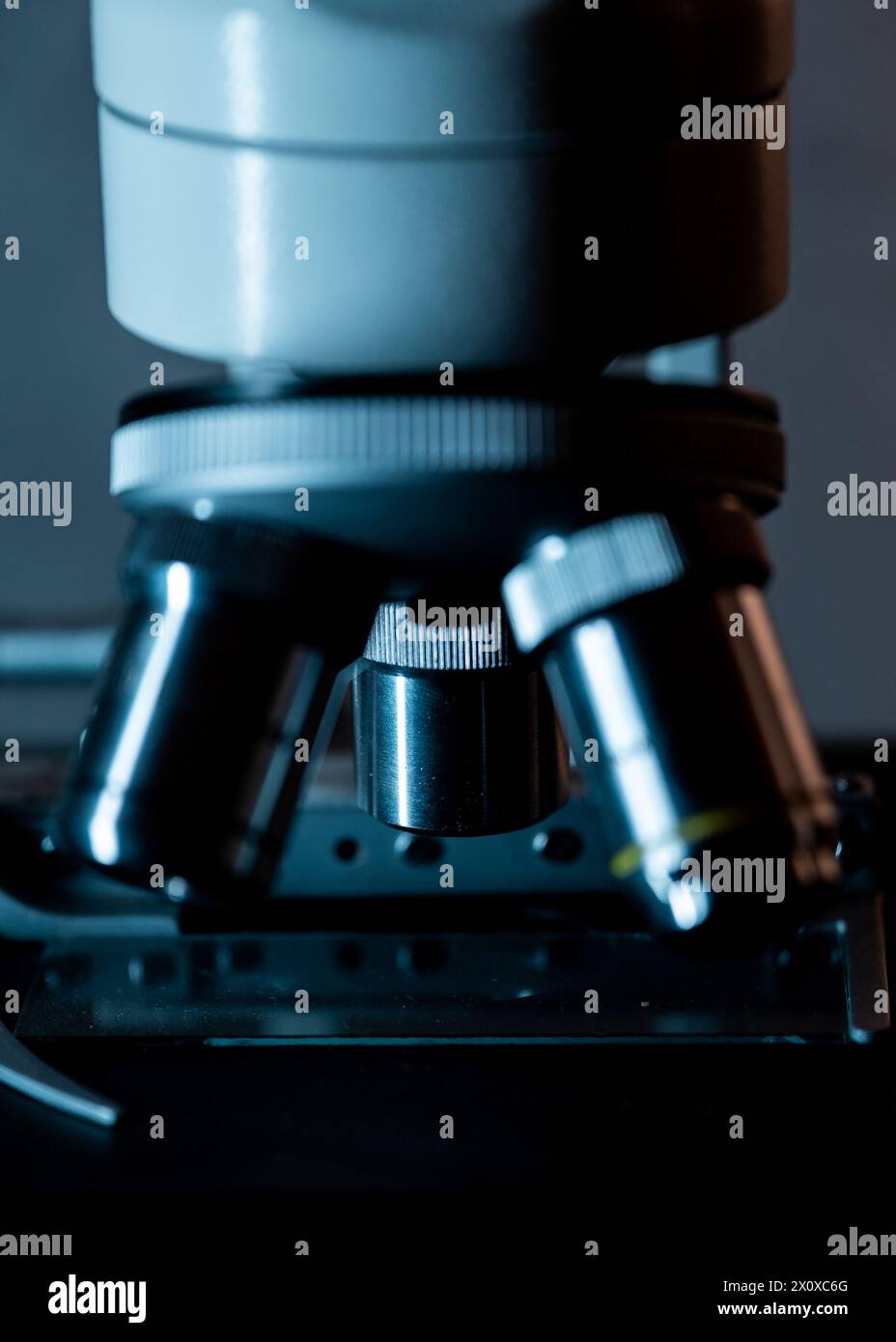 Medical microscope lenses close up, In warm blue lighting Stock Photo ...