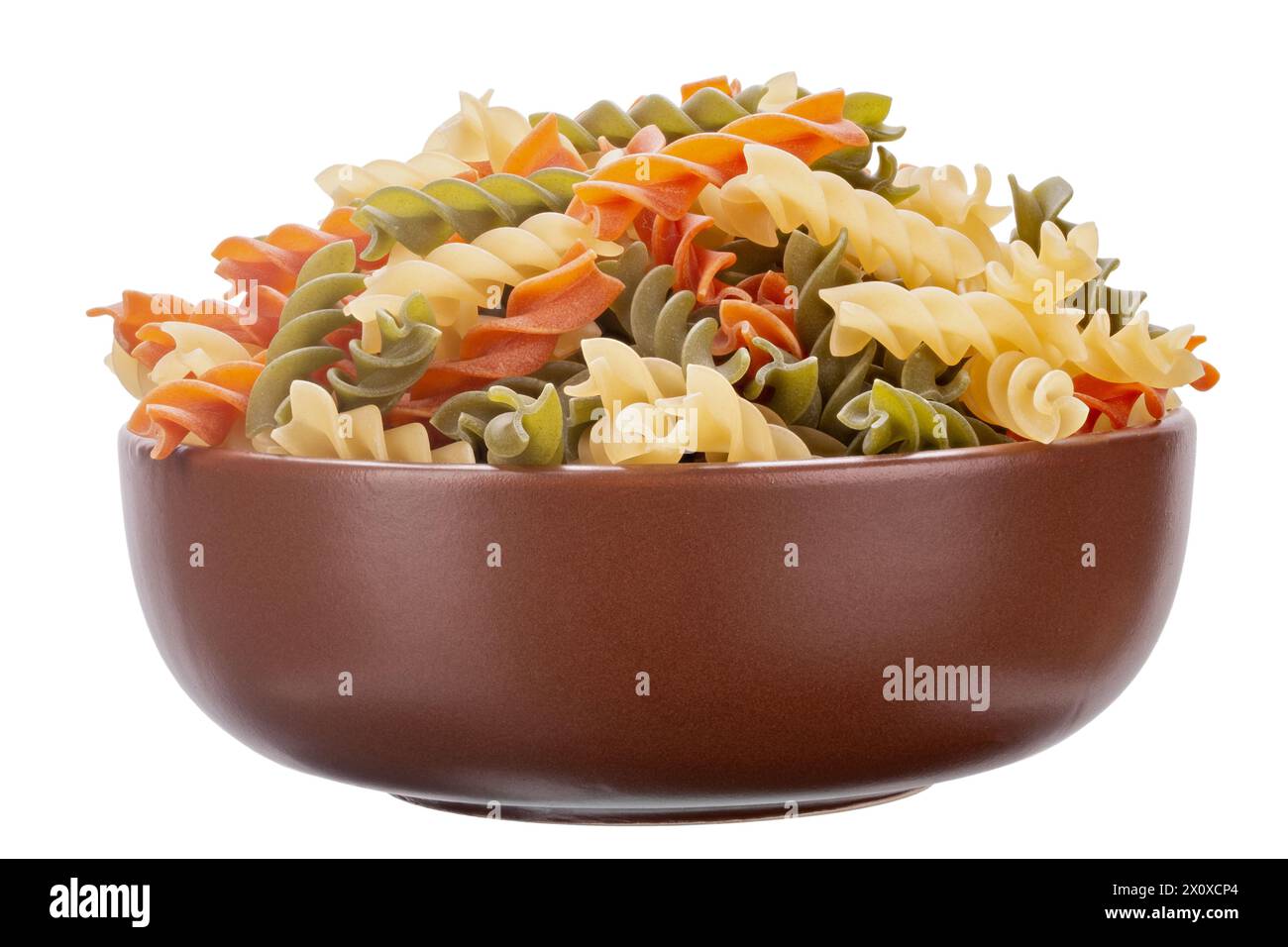 Raw tricolor fusilli or rotini pasta (traditional, tomato and spinach ...