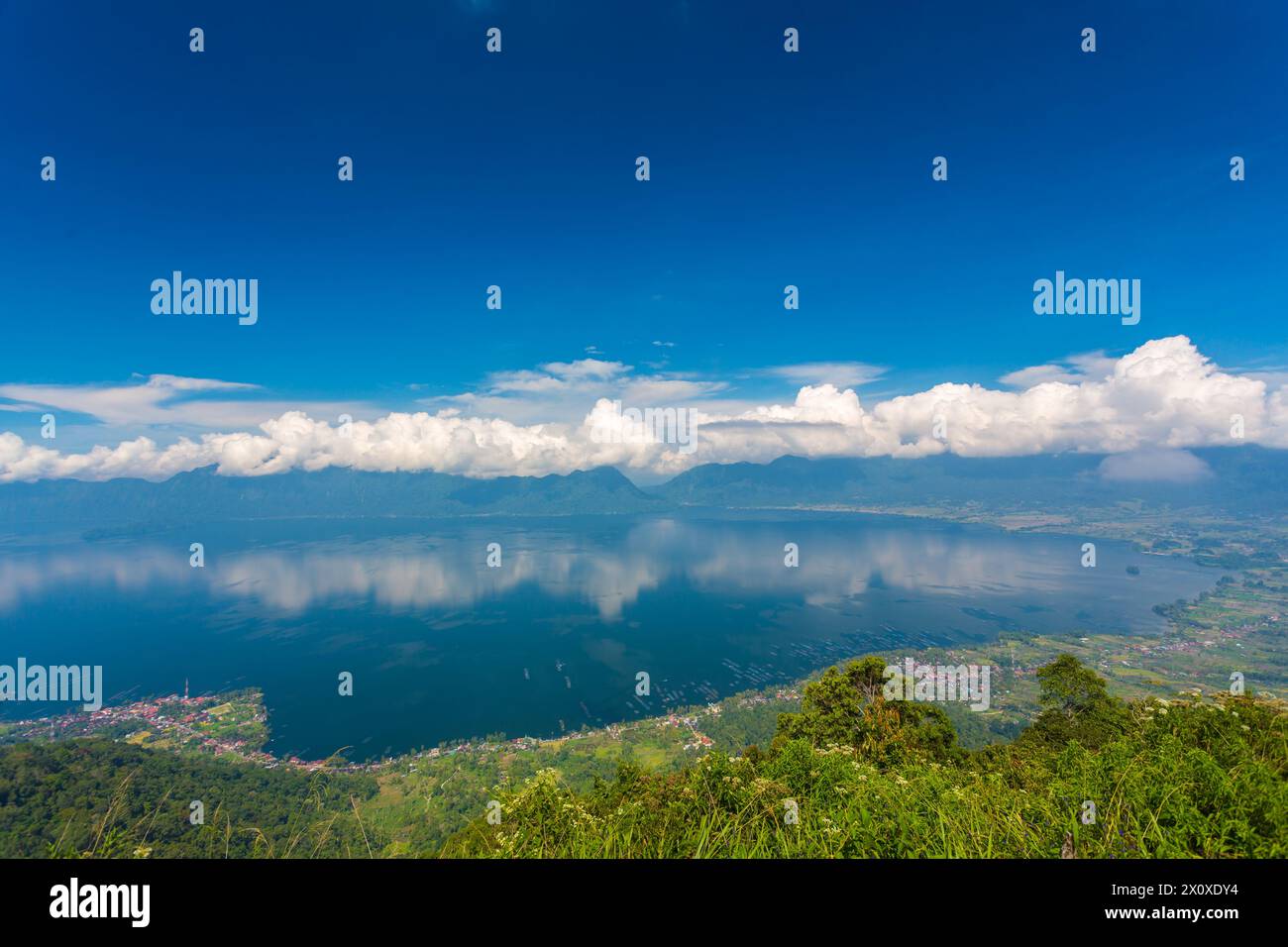 Lake Maninjau is a caldera lake in West Sumatra, Indonesia. It is ...
