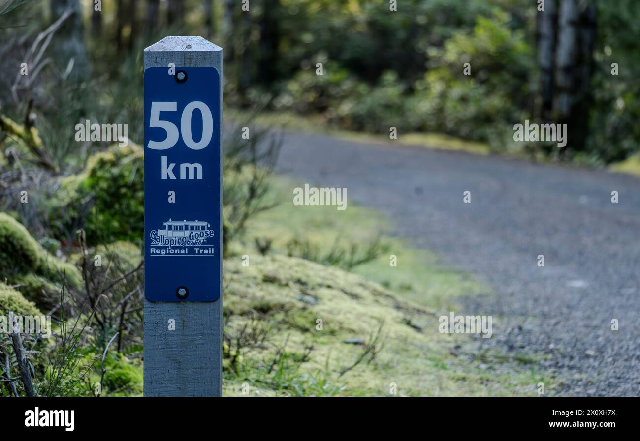 The 50 kilometer marker on the Galloping Goose Regional Trail in Sooke ...