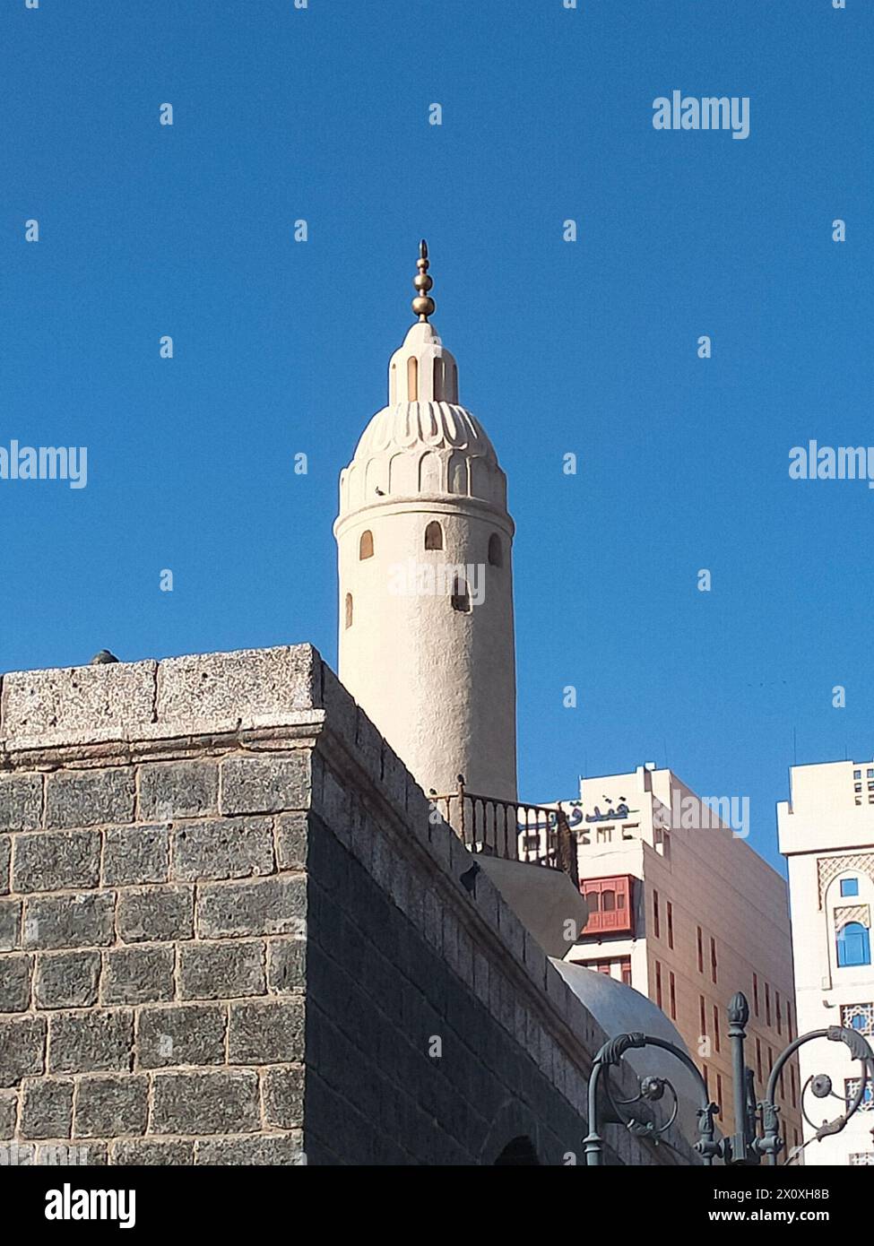 Mosque tower in Medina, Saudi Arabia with blue sky background Stock ...