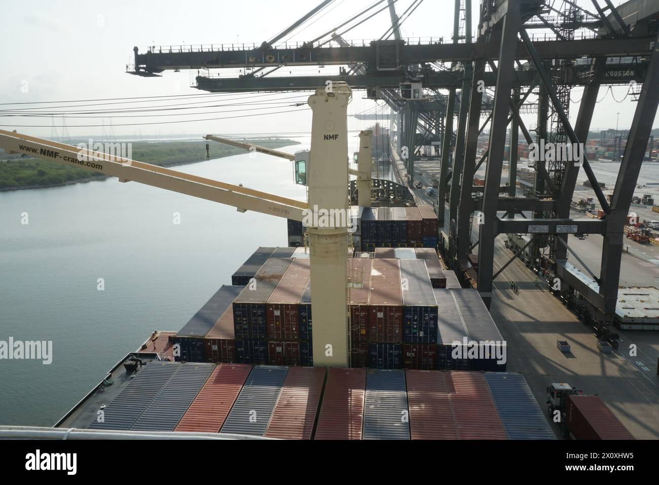 Container vessel equipped with cranes during cargo operation loading ... Container vessel equipped with cranes during cargo operation loading ...