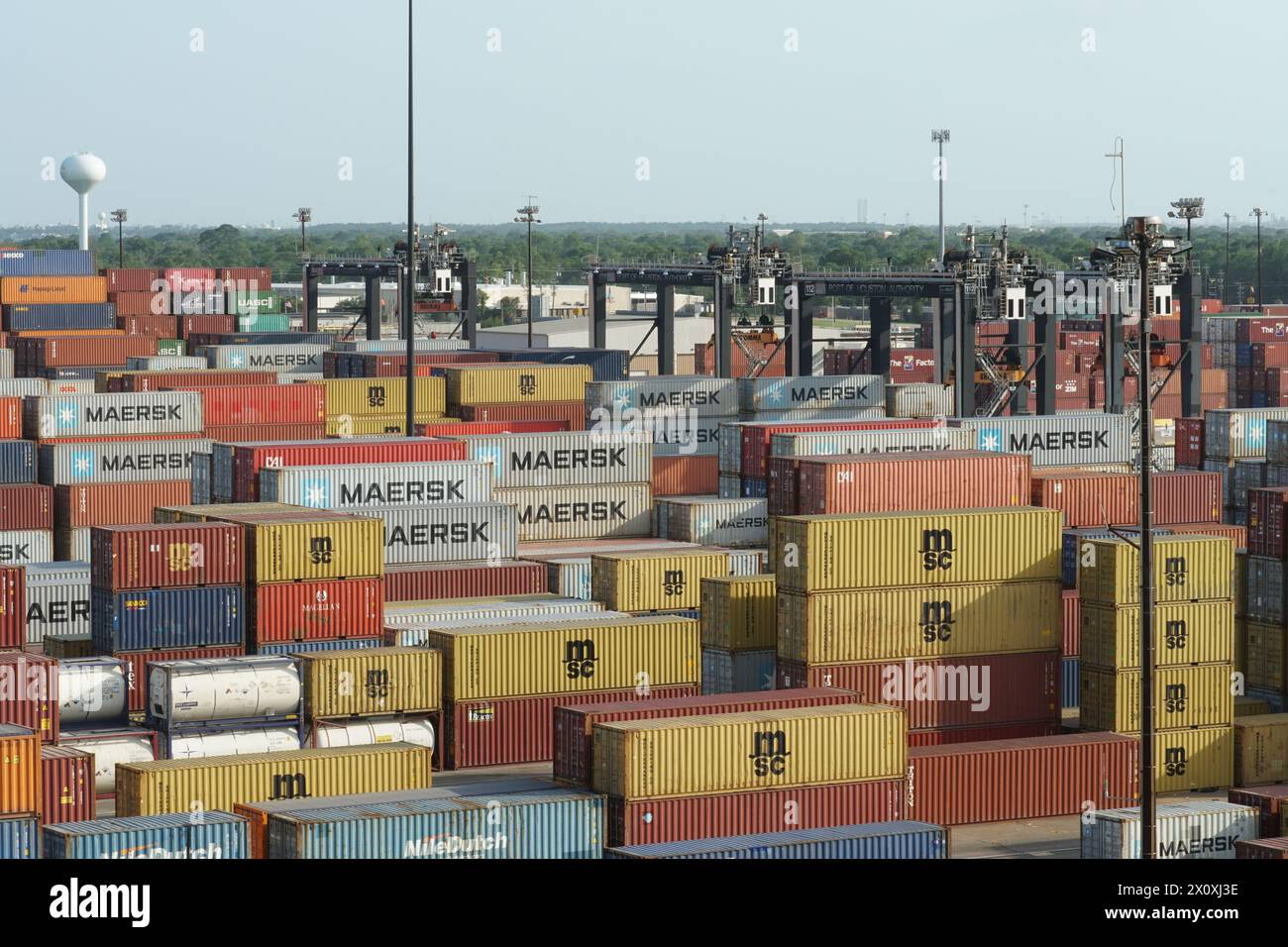Stowed colorful containers from various shipper situated in cargo ...