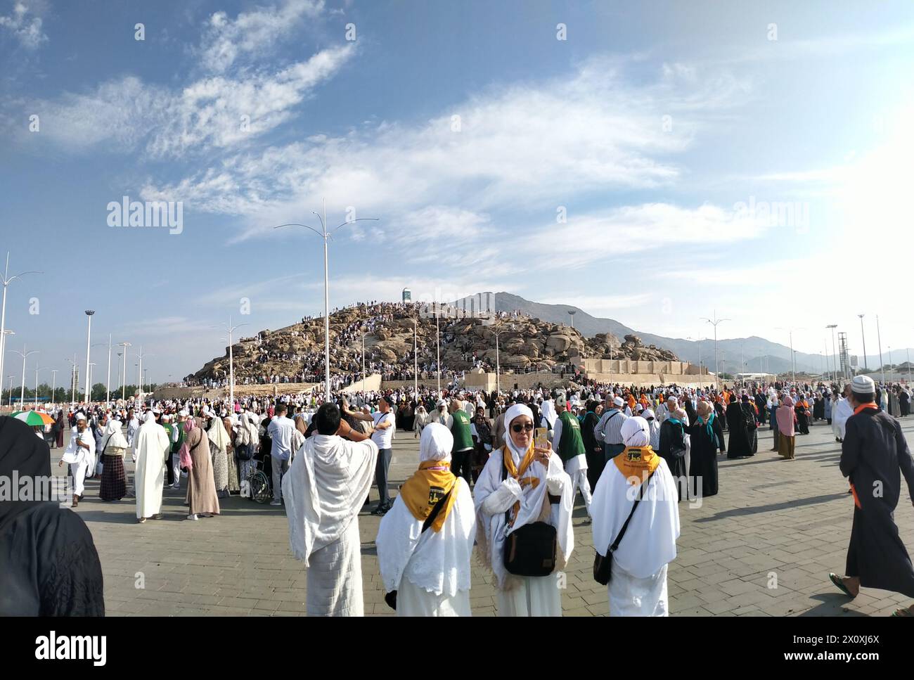 Umrah pilgrims visiting Jabal Rahmah on a hot day in Makkah, Saudi ...
