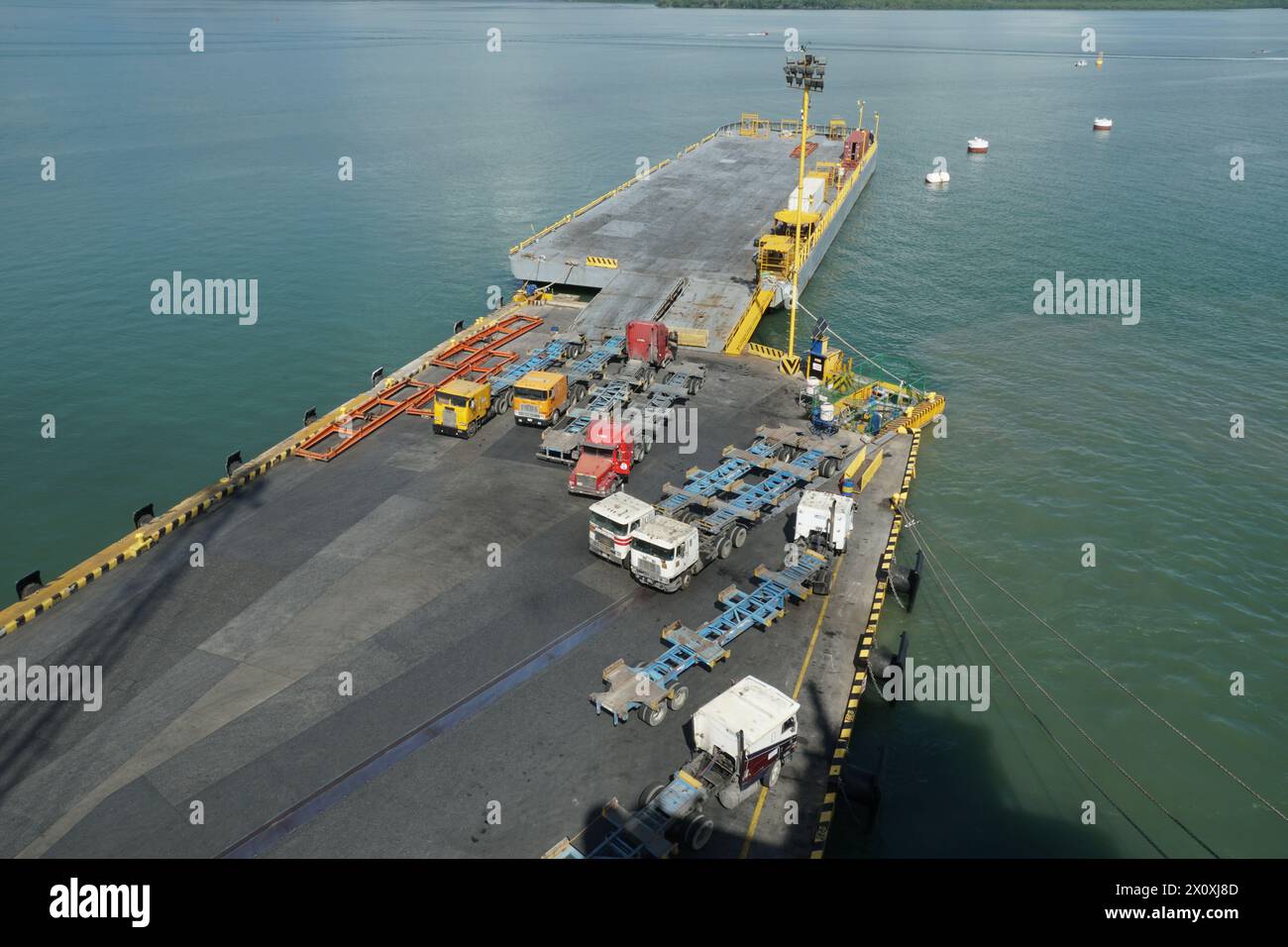 Container terminal in Puerto Barrios with old empty trucks and lorries ...