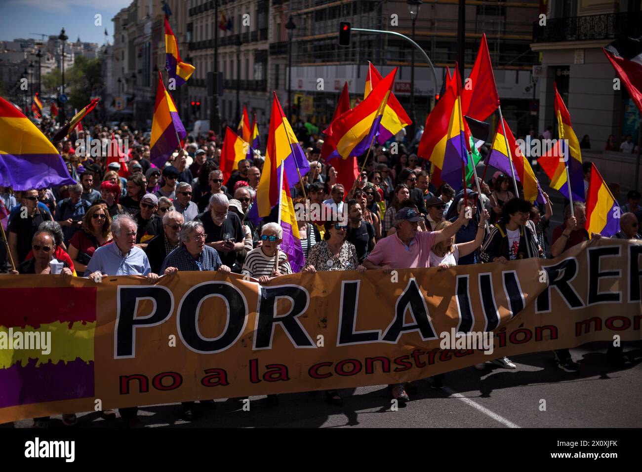 Madrid, Madrid, Spain. 14th Apr, 2024. Hundreds of people with banners ...