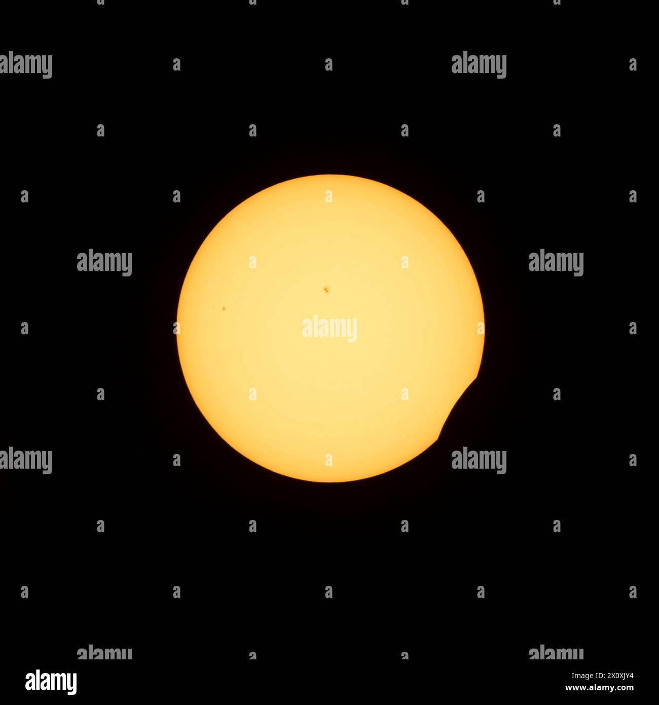 The sun and moon after first contact during the total solar eclipse on ...