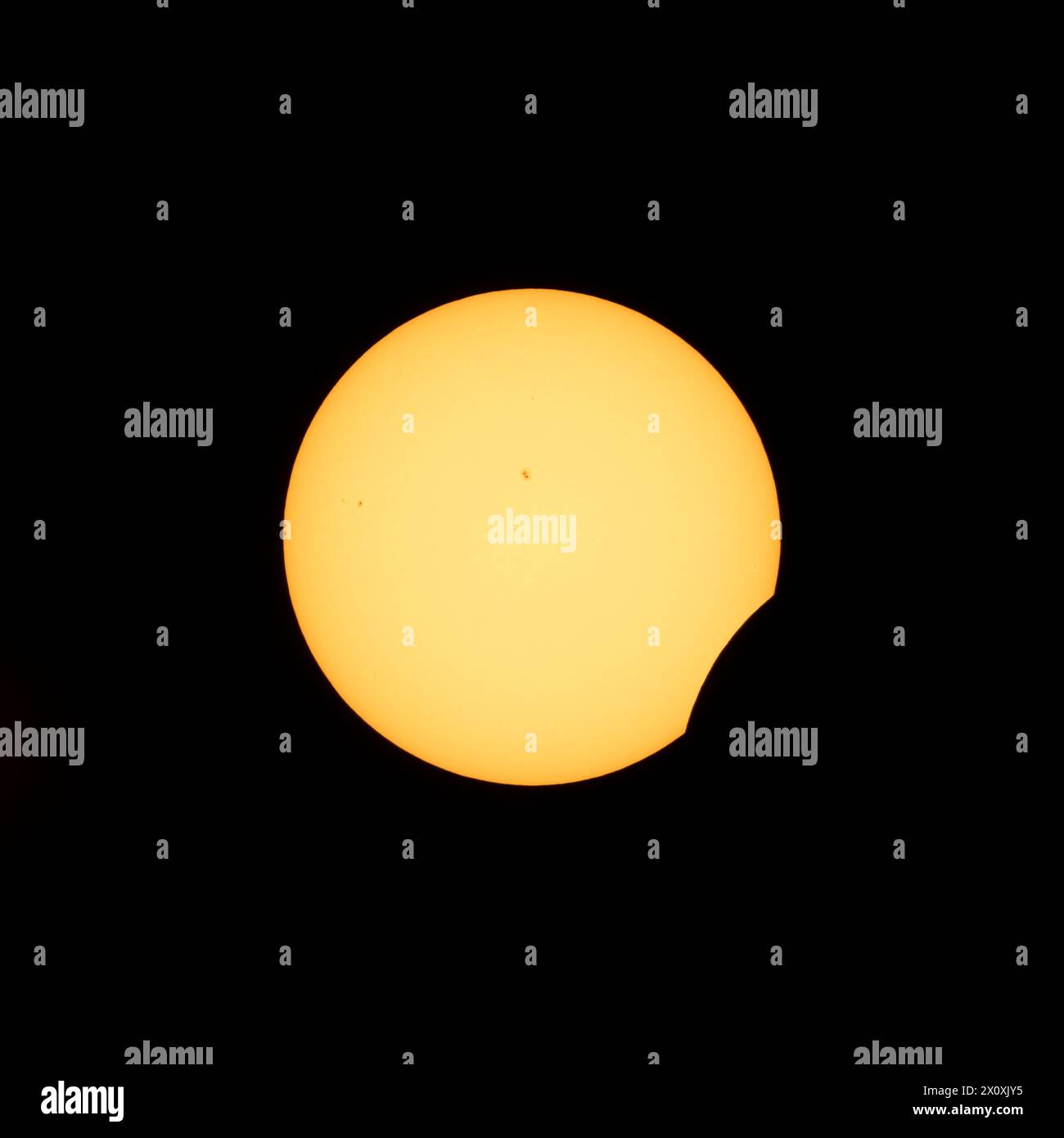 The sun and moon after first contact during the total solar eclipse on ...