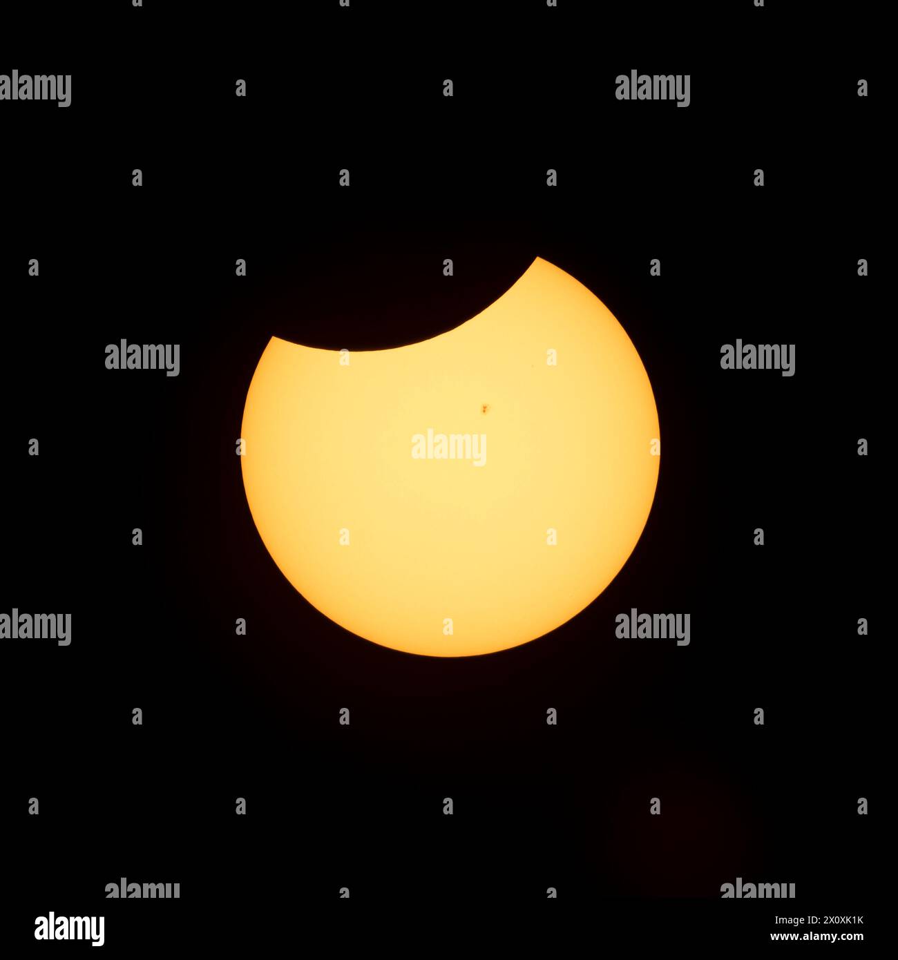 The sun and moon nearing fourth contact during the total solar eclipse ...