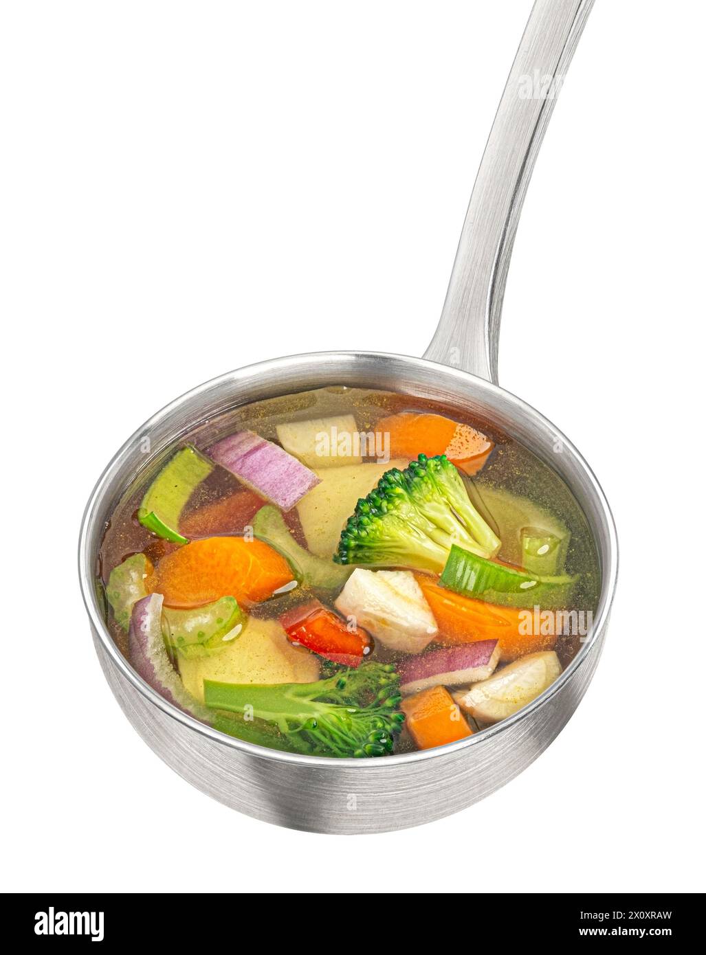 Ladle with vegetable soup isolated on white background Stock Photo - Alamy