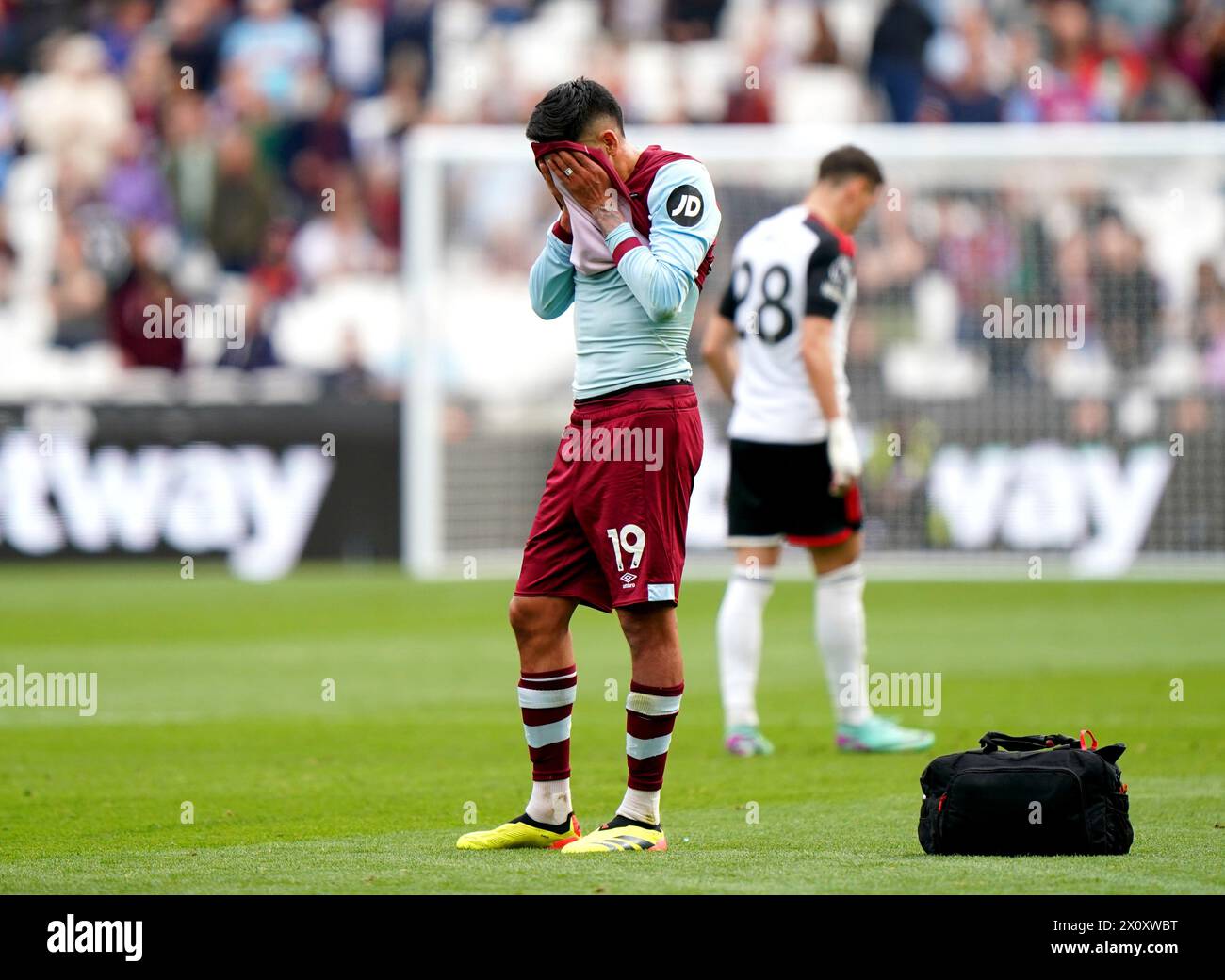 West Ham United's Edson Alvarez reacts after team-mate George Earthy ...