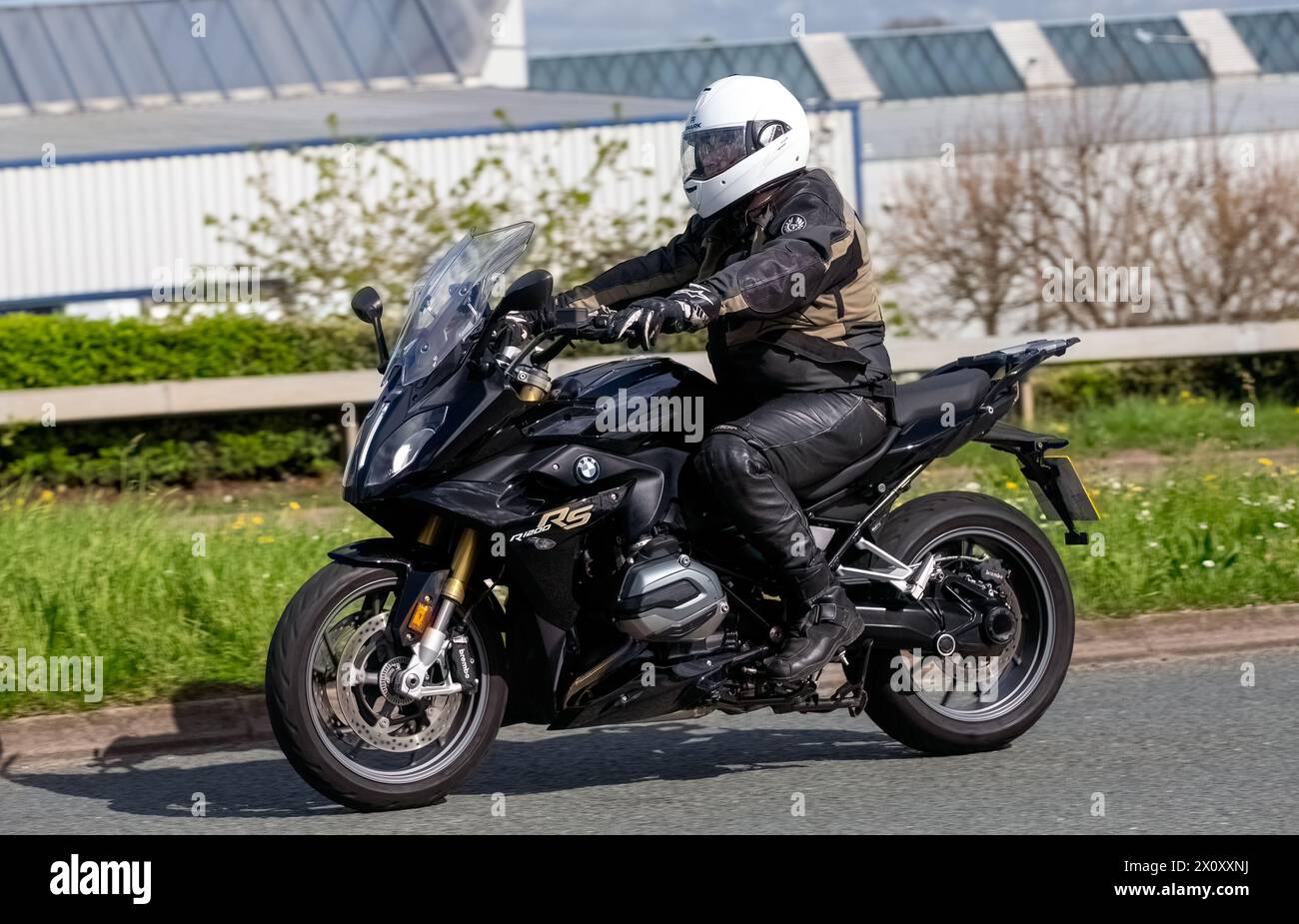 Milton Keynes,UK- Apr 14th 2024: 2017 BMW R1200 motorcycle travelling ...