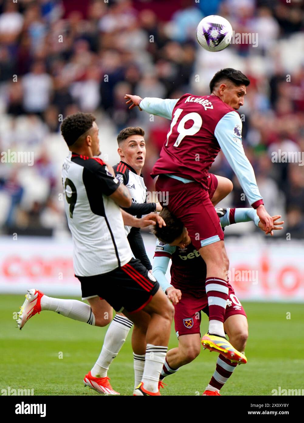 West Ham United's George Earthy and Edson Alvarez clash into each other ...
