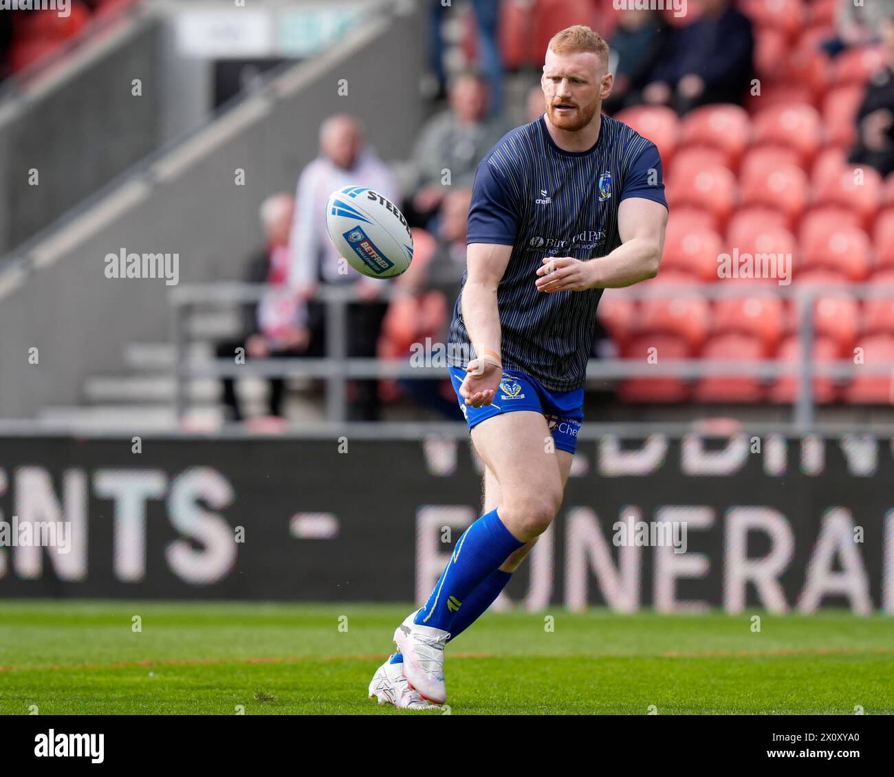 Joe Bullock of Warrington Wolves warms up before the Betfred Challenge ...