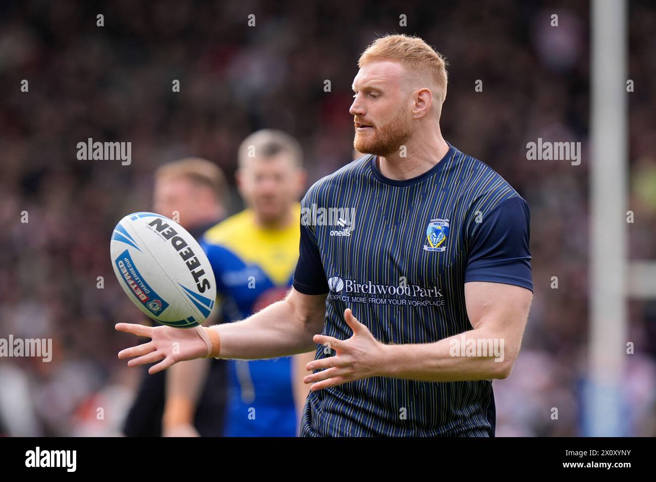 Joe Bullock of Warrington Wolves warms up before the Betfred Challenge ...