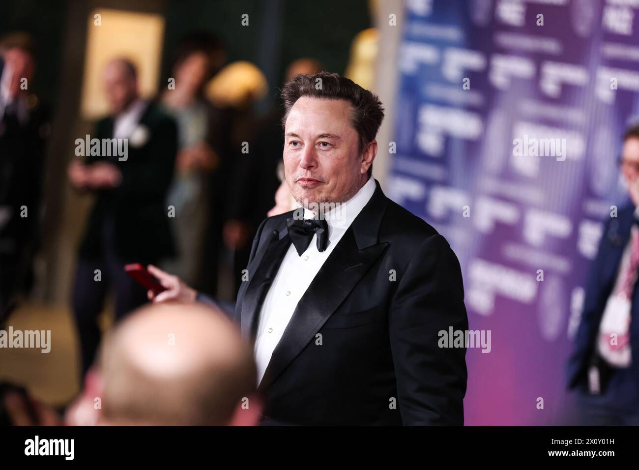 LOS ANGELES, CALIFORNIA, USA - APRIL 13: Elon Musk arrives at the 10th ...