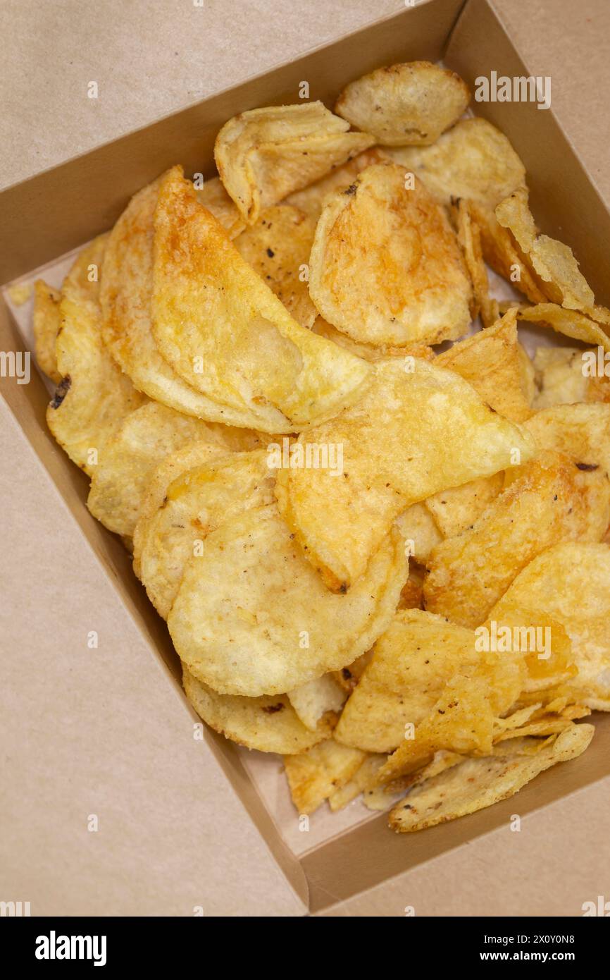 Crisps potato chips, salt and vinegar flavour, in a card carton box ...