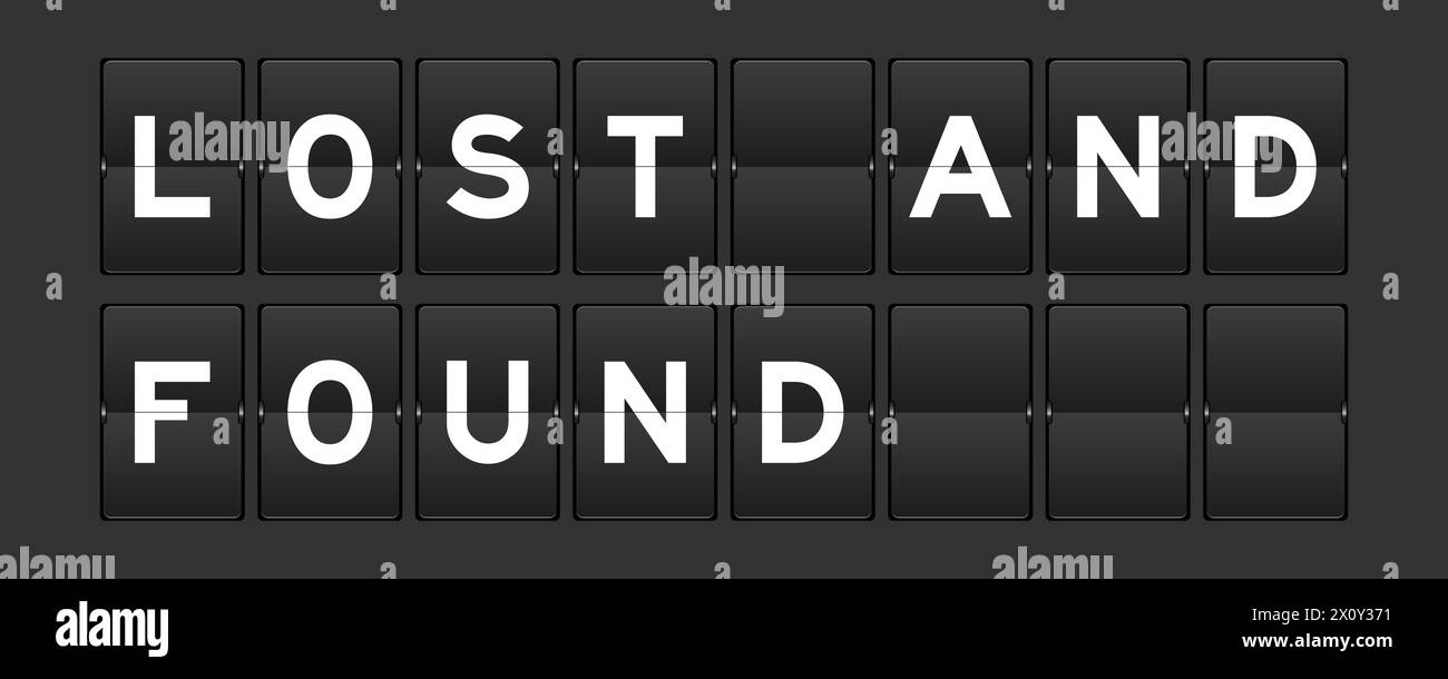 Black color analog flip board with word lost and found on gray ...