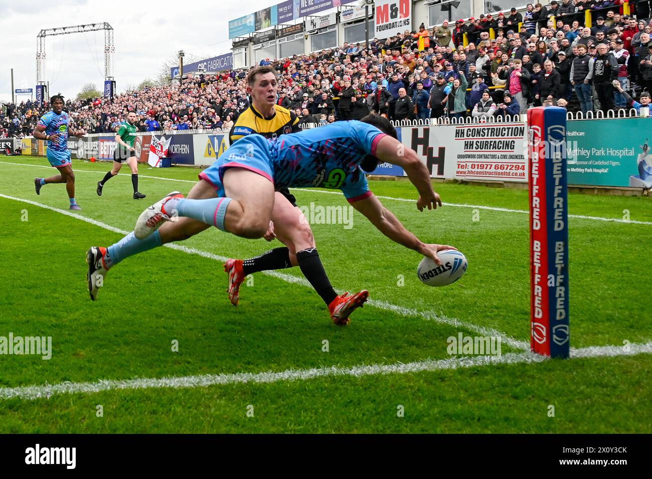 Adam Keighran of Wigan Warriors scores a try to make the score 6-54 ...