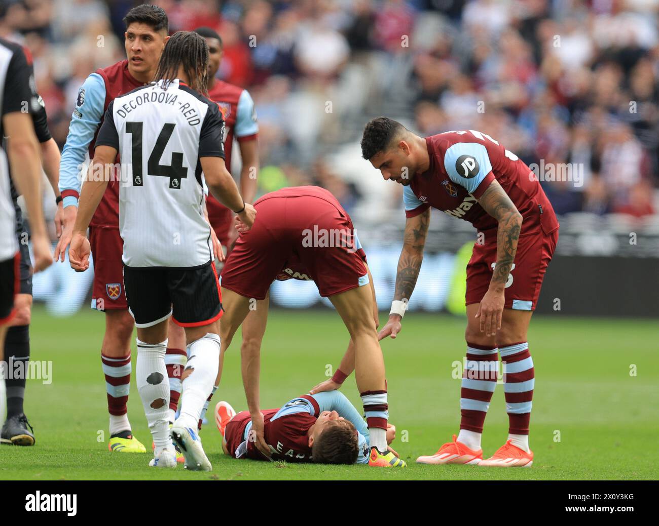 London, UK. 14th Apr, 2024. George Earthy of West Ham United lays on the floor after a collision ...